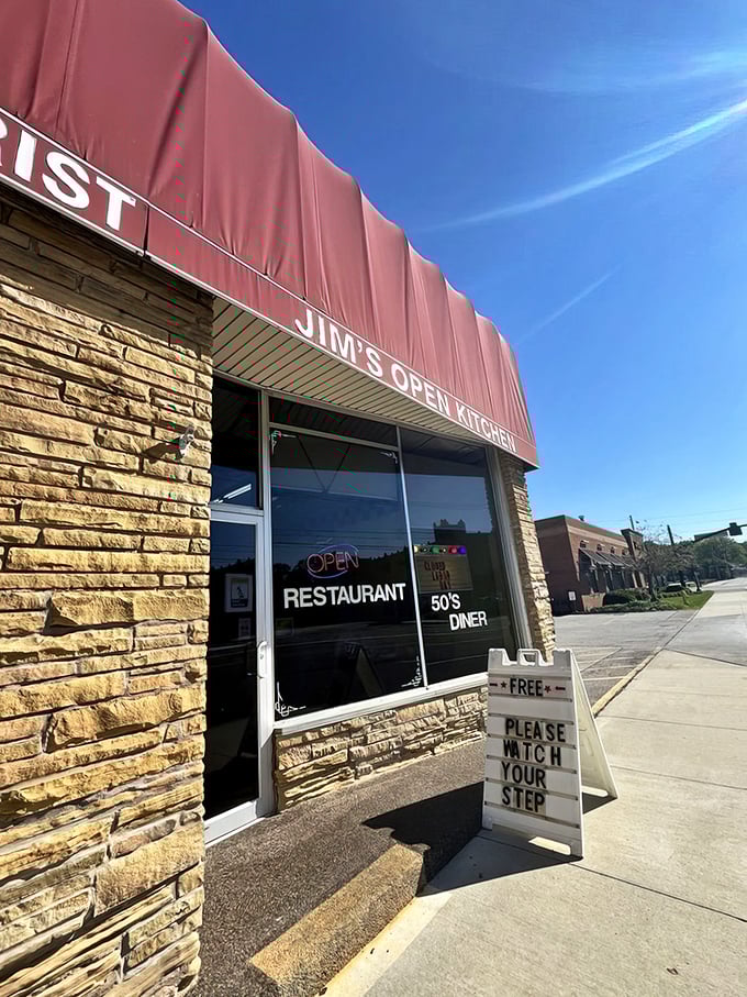 "PLEASE WATCH YOUR STEP" warns the sign, but the real danger at Jim's Open Kitchen is falling head over heels for their homestyle cooking and 1950s diner atmosphere.