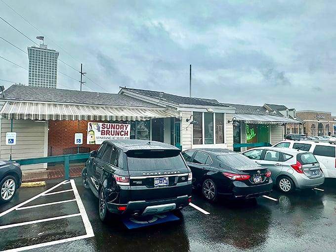 Half Shell's simple white exterior with striped awnings and bright yellow window is like finding a beachside cottage mysteriously transported to the heart of Memphis.