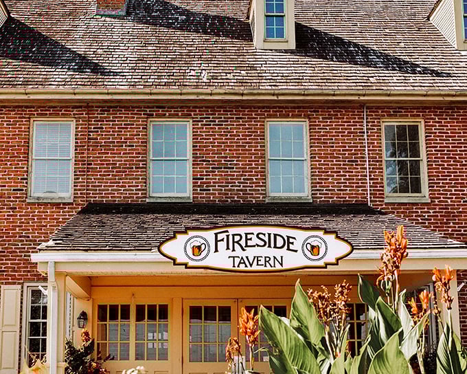 The historic brick facade of Fireside Tavern stands proudly in Strasburg, a culinary beacon that's been calling hungry travelers home for generations.