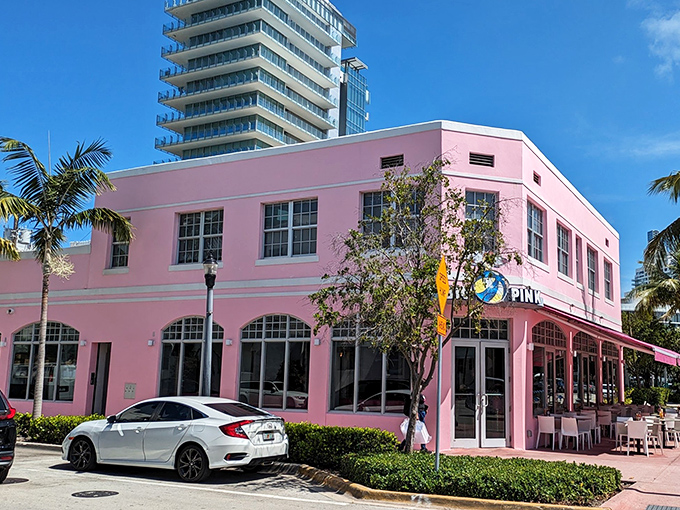 Miami Beach's most eye-catching landmark isn't a celebrity—it's a building that looks like it was dipped in Pepto-Bismol. Gloriously unapologetic!