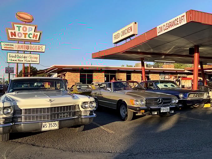 Classic cars meet classic burgers under that iconic neon sign. Time travel isn't just possible in Austin—it's served with fries and a shake.