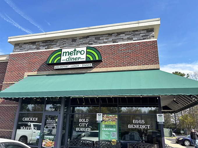 The brick facade and green awning of Metro Diner isn't trying to impress anyone—until you taste what's cooking inside. Classic Americana at its finest.