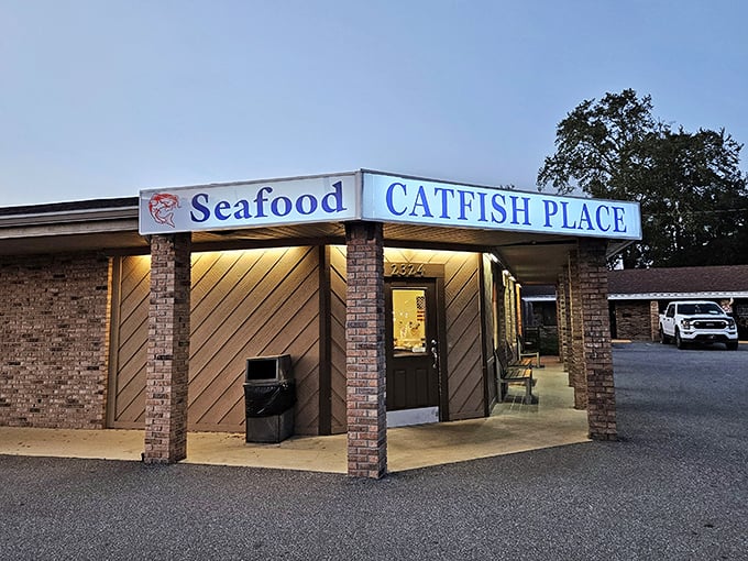 The unassuming brick exterior of The Catfish Place glows at dusk, like a lighthouse beckoning hungry travelers to safe, delicious harbor.