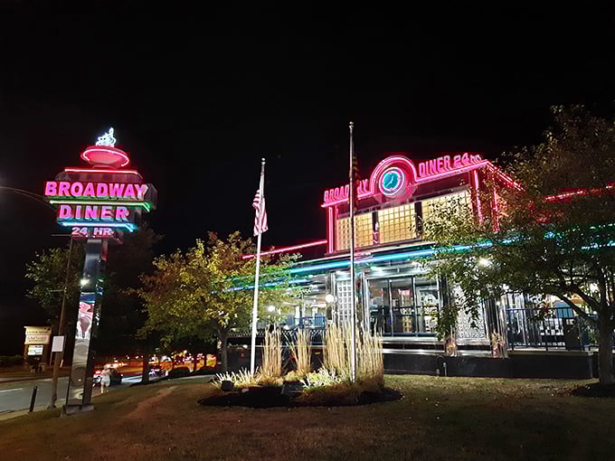That neon glow promises serious comfort food magic – Broadway Diner's exterior welcomes you home before you even step inside.