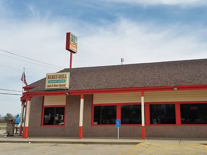 The humble exterior of Mama's Porch and Grill promises no frills, just honest cooking that's been drawing Batavia locals for years. Red trim and a simple sign—all you need to know.
