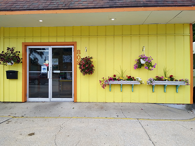 That sunshine-yellow exterior isn't just eye-catching—it's a promise of the warmth waiting inside. Like a beacon of breakfast hope on a cloudy Indiana morning.