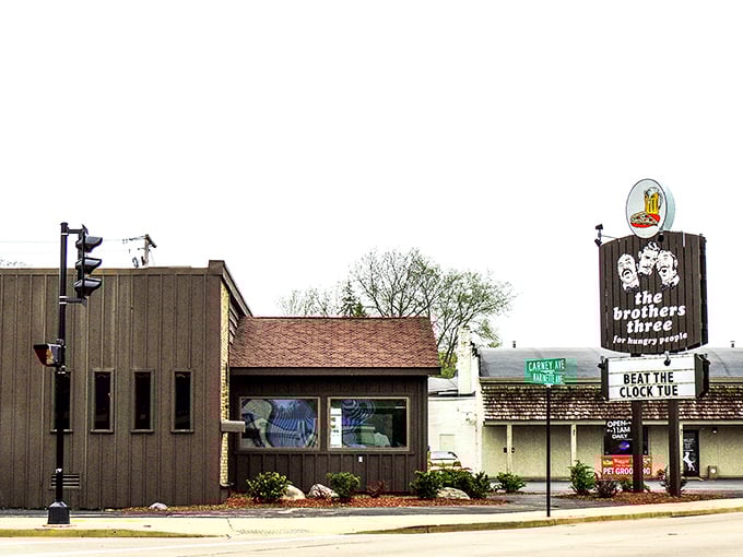 The unassuming exterior of The Brothers Three in Marinette might not scream "culinary destination," but that's part of its charm – the best treasures are often hidden in plain sight.