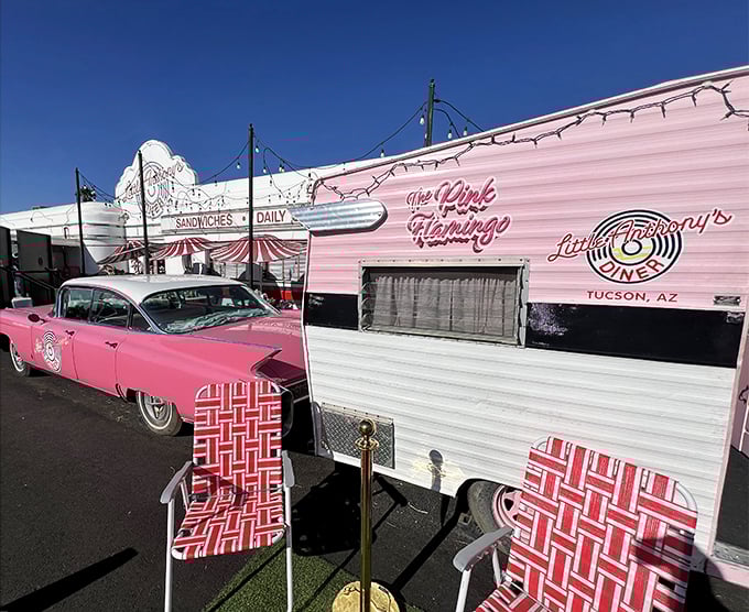 The Pink Flamingo trailer and classic Cadillac create the perfect time-travel portal. Tucson sunsets and 1950s chrome – a match made in nostalgic heaven.