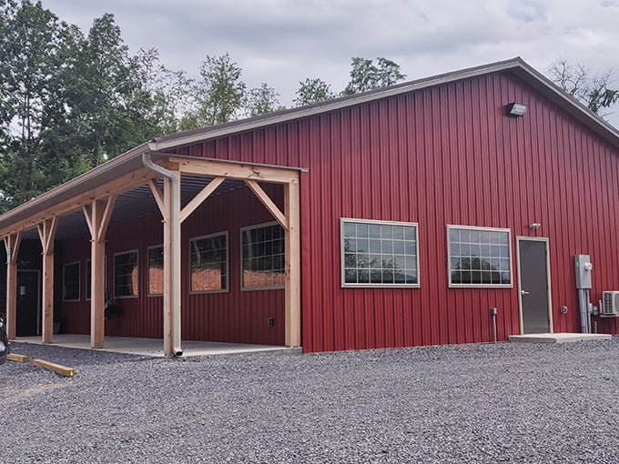 The barn-red exterior isn't just country chic—it's a beacon of comfort food promise nestled in McConnellsburg's rolling landscape.