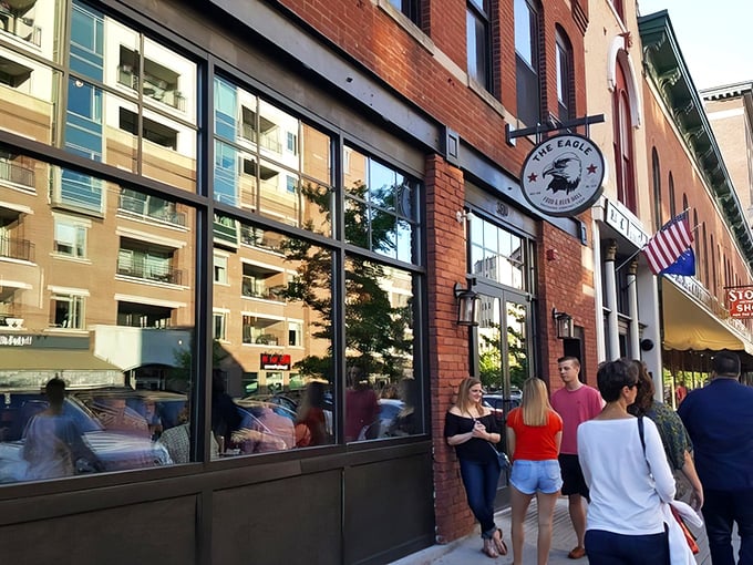 The brick facade of The Eagle on Mass Ave beckons hungry passersby with its understated charm and the promise of Southern comfort food done right.