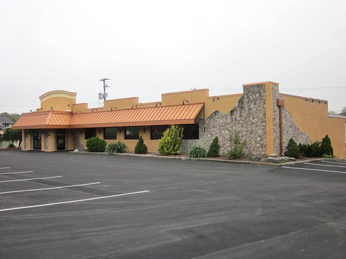 The terracotta-colored exterior of Copperhead Grille stands like a culinary oasis in Bethlehem, promising delicious treasures within those stone-accented walls.