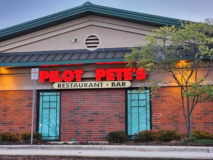 As dusk settles, Pilot Pete's neon sign glows like a runway beacon, guiding hungry travelers to this suburban oasis of comfort food and flight-inspired fun.