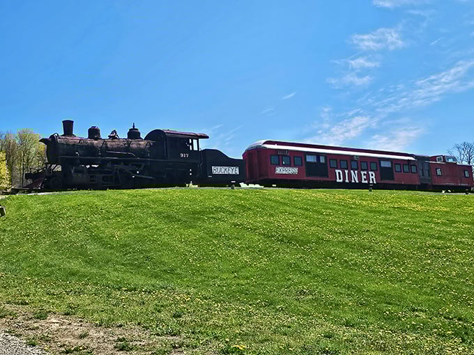 Not just any roadside attraction—this scarlet and gray dining car against the blue Ohio sky is what happens when railroad history meets comfort food cravings.