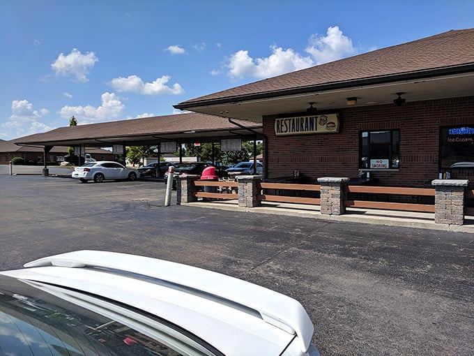 The classic drive-in silhouette of B & K Root Beer Stand beckons like a time machine disguised as a restaurant. Nostalgia never tasted so good.
