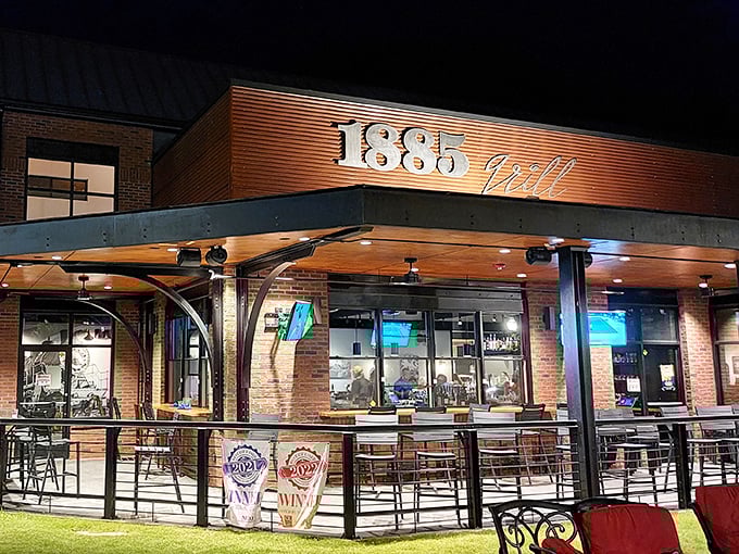 The warm glow of 1885 Grill's exterior beckons like a lighthouse for hungry souls navigating the sea of mediocre dining options.