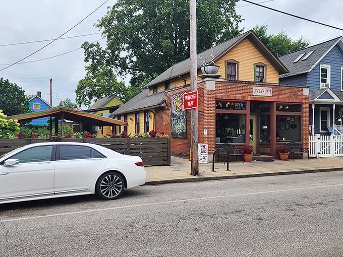 Lucky's Café welcomes hungry patrons with its charming brick exterior and warm burgundy trim—like a culinary lighthouse beckoning food lovers to safe harbor.