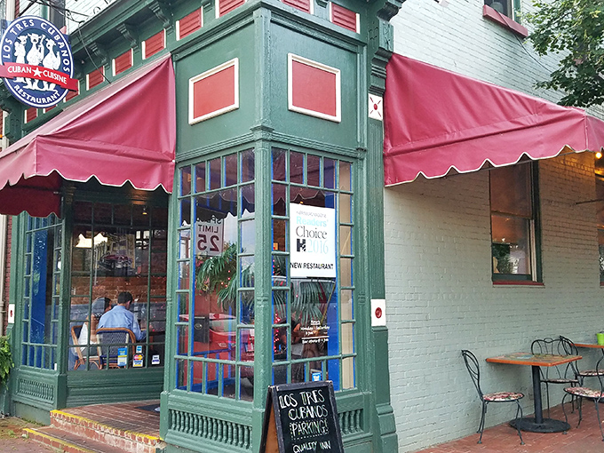 The mint-green facade with vibrant red awnings isn't just charming—it's a portal to Havana hiding in plain sight on a Harrisburg street corner.
