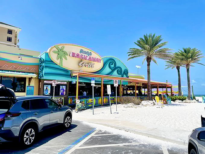 The turquoise beacon of Frenchy's Rockaway Grill stands out against Clearwater's white sand like a tropical mirage that actually delivers on its promises.