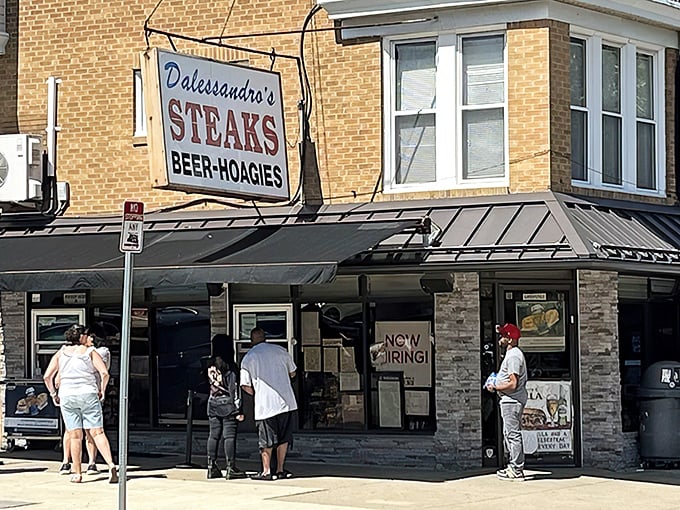 The line forms early at Dalessandro's, where locals and tourists unite in the universal language of sandwich anticipation.