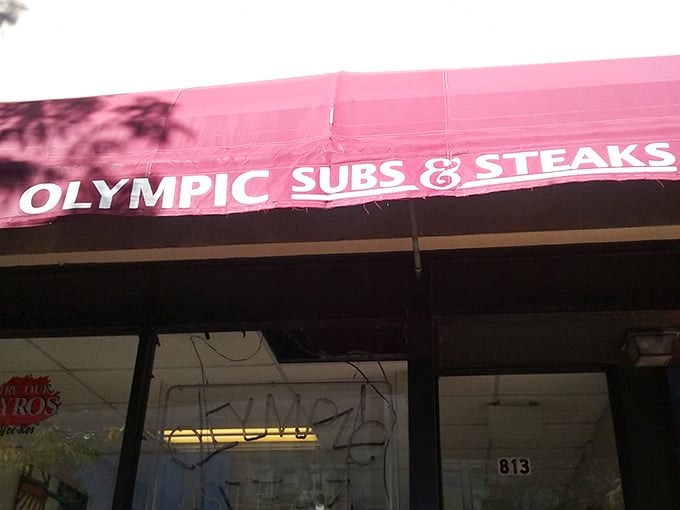 That red awning isn't just a splash of color—it's a landmark for locals who know where true sandwich artistry happens in Delaware.