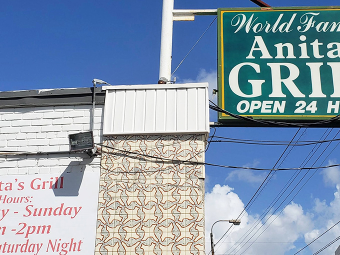 The iconic green sign promises "World Famous" fare and 24-hour service—a beacon of hope for hungry souls at any hour in the Crescent City.