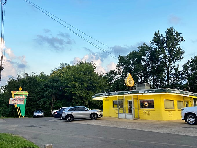The sunshine-yellow exterior of The Lemon Drop isn't just a building—it's a time machine to when restaurants knew exactly what they were and embraced it wholeheartedly.