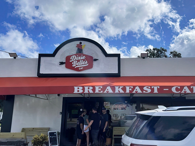 The iconic Dixie Belle's Cafe storefront beckons with its cheerful red awning and promise of breakfast bliss. Like finding a $20 bill in your winter coat pocket – unexpected joy awaits.