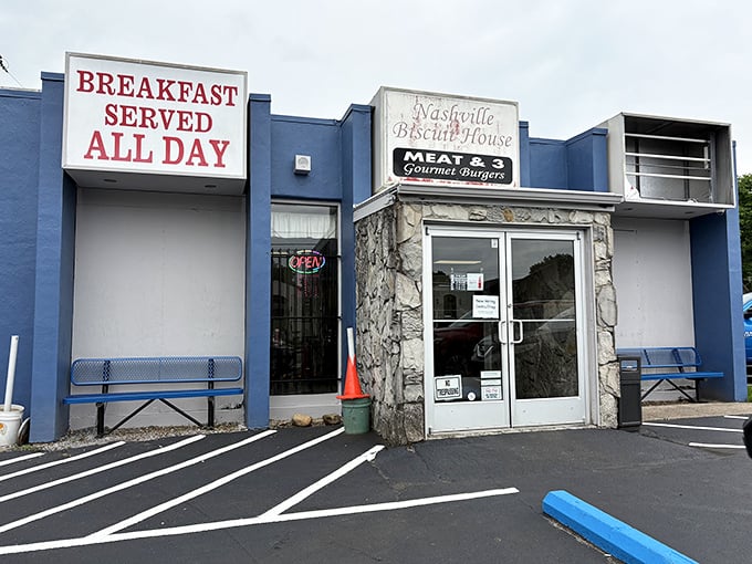 The blue exterior of Nashville Biscuit House promises "BREAKFAST SERVED ALL DAY" – six words that should be on every city's welcome sign.