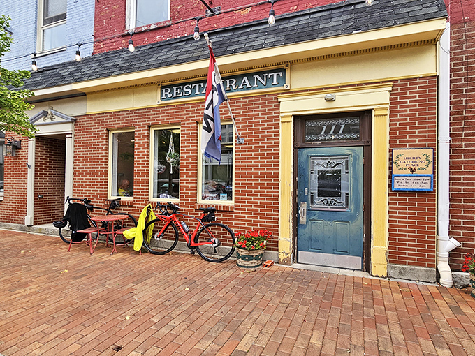 The classic brick façade of Liberty Gathering Place welcomes you like an old friend, complete with bicycles parked outside – a true small-town Ohio greeting.