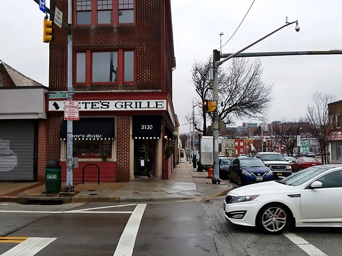 The unassuming corner spot that houses Pete's Grille stands like a beacon of breakfast hope on Greenmount Avenue. No fancy frills, just the promise of honest-to-goodness food inside.