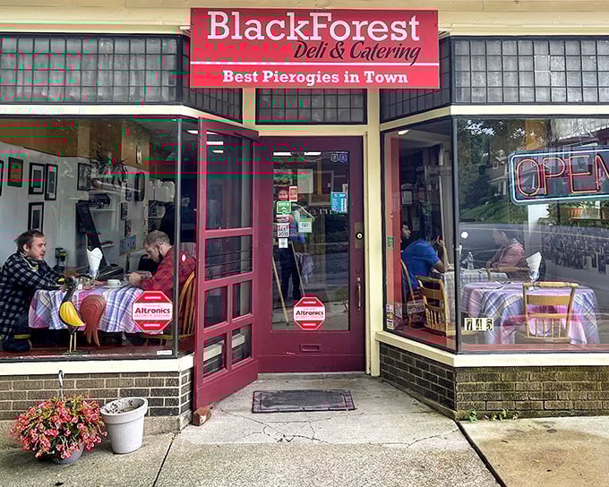 The unassuming storefront that houses culinary treasures more valuable than gold. Red sign, big promise: "Best Pierogies in Town" isn't bragging—it's a public service announcement.