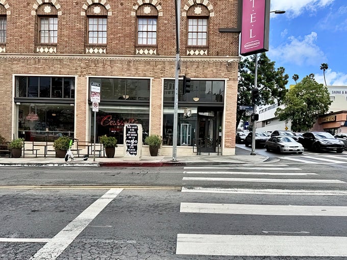 Cassell's classic brick storefront in the historic Hotel Normandie brings a touch of timeless charm to Koreatown's bustling streetscape.