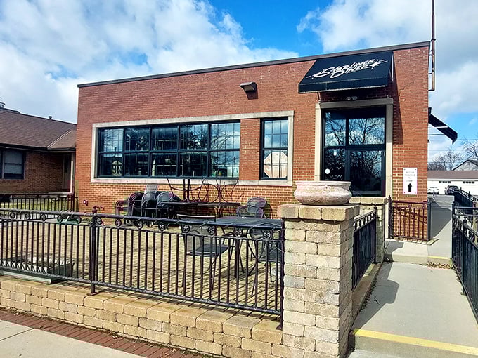 Winter sunshine bathes Starliner's façade, where the patio waits patiently for warmer days and breakfast enthusiasts seeking their morning orbit.