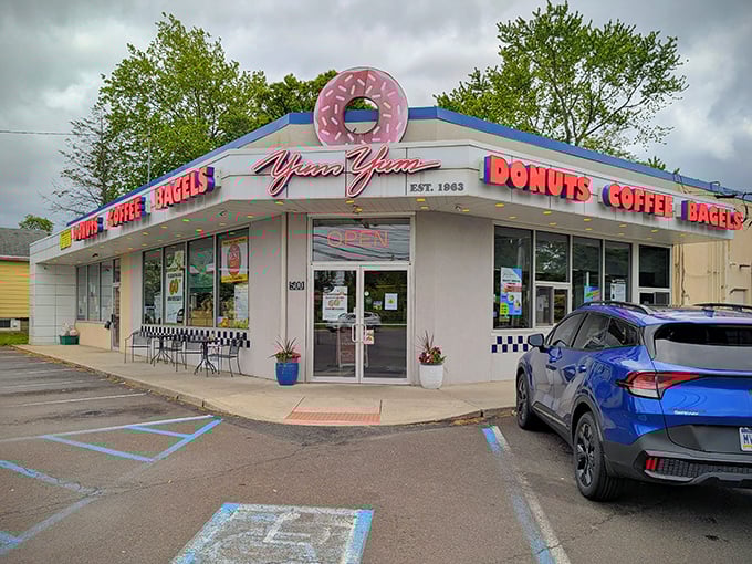 That iconic donut sign isn't just decoration – it's a beacon calling hungry souls to breakfast paradise.