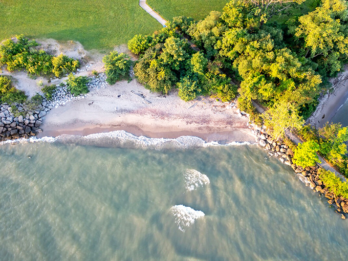 The golden stretch of sand meets Lake Erie's blue horizon, creating Ohio's answer to coastal paradise. Who needs an ocean when perfection is right here?