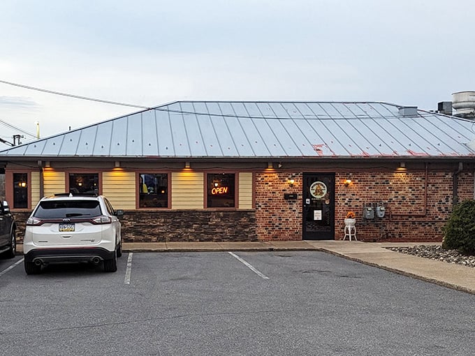 The unassuming brick exterior of Bonfire BBQ hides a smoky paradise within – like finding a treasure chest disguised as an ordinary box.