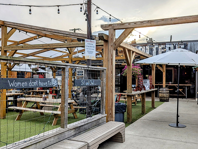 The outdoor dining area at Walter's combines rustic charm with Pittsburgh practicality—string lights overhead turn ordinary picnic tables into the perfect spot for carnivorous communion.