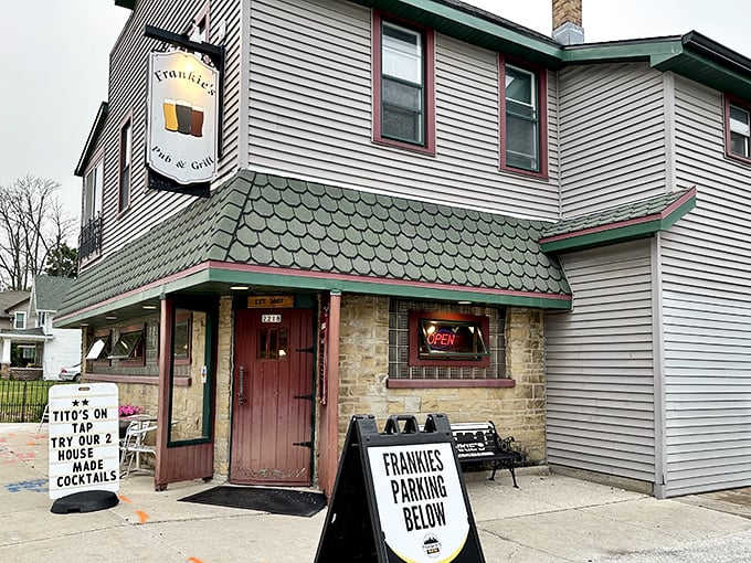 The unassuming exterior of Frankie's Pub & Grill hides a culinary treasure within. That stone facade and vintage sign promise authentic Wisconsin hospitality without pretense.