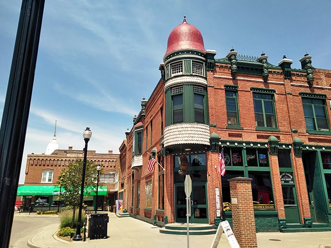 That iconic red dome isn't just architectural eye candy—it's Stevens Point's beacon for hungry travelers seeking refuge from ordinary dining.
