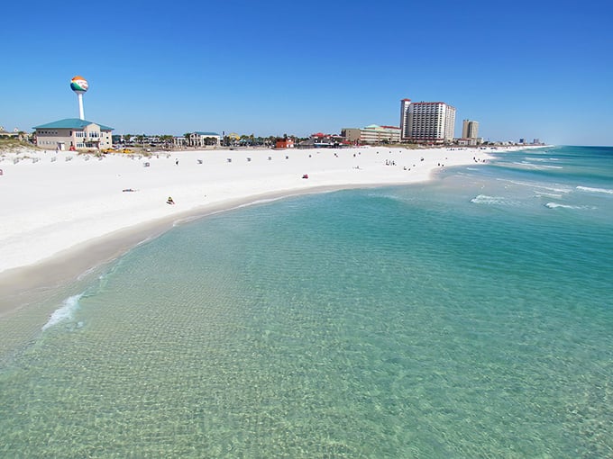 The emerald waters of Pensacola Beach stretch out like nature's welcome mat. Those sugar-white sands aren't just for postcards—they're your potential backyard.