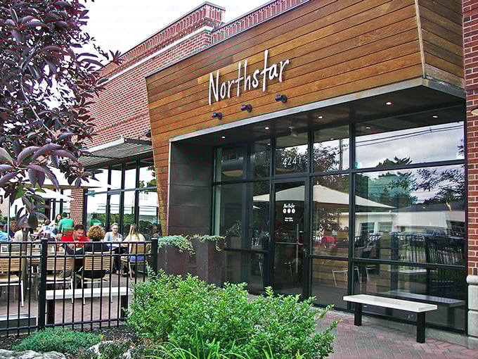 Northstar's wooden facade beckons like an old friend in Columbus' Short North district, where outdoor diners bask in Ohio sunshine and urban energy.