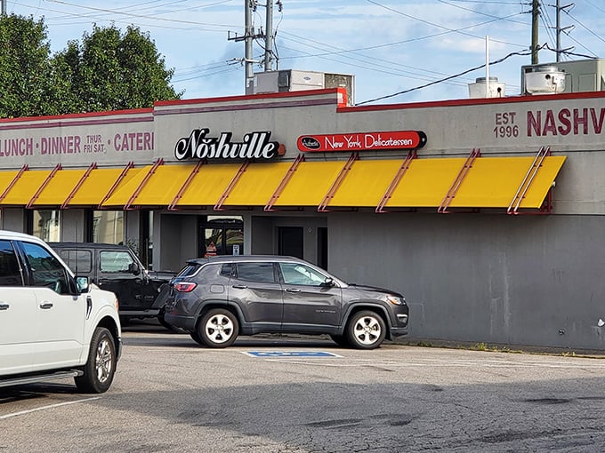 That iconic yellow awning is like a beacon of deli hope in a sea of Nashville hot chicken. Noshville's exterior promises New York authenticity with Tennessee hospitality.