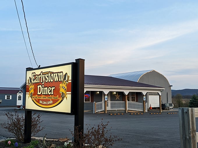 The unassuming exterior of Earlystown Diner stands like a beacon of hope for hungry travelers. Blue skies promise good things inside.