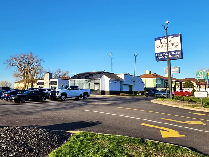 The unassuming exterior of Jolly Rogers stands like a beacon for seafood lovers, promising Lake Erie's finest catches behind those modest walls.