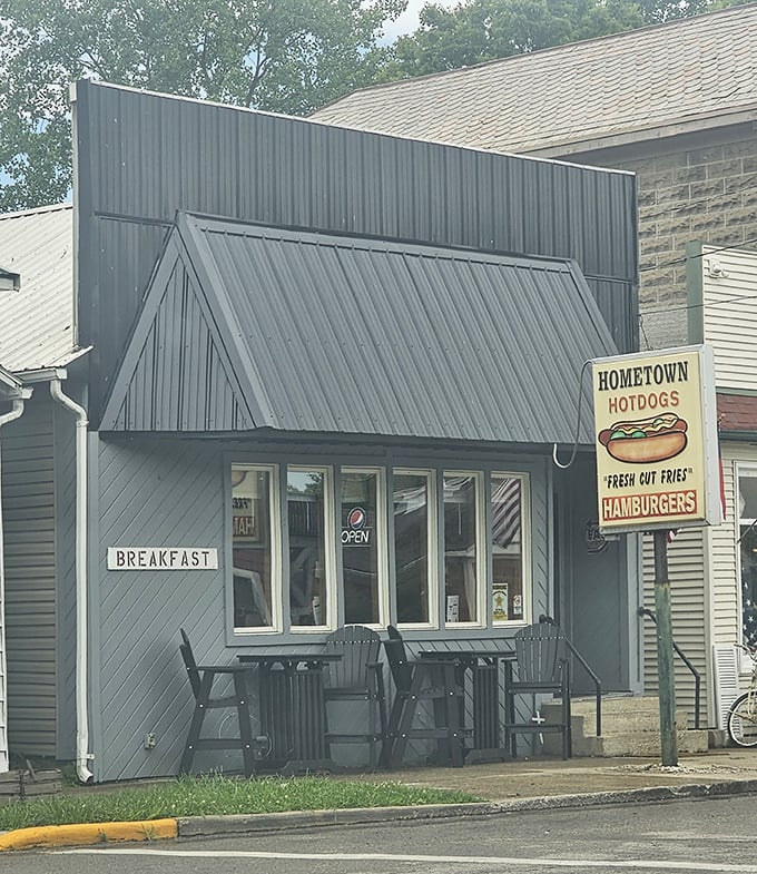 The unassuming exterior of Hometown Hot Dogs stands like a beacon of hope for hungry travelers – simple, straightforward, and promising delicious things inside.