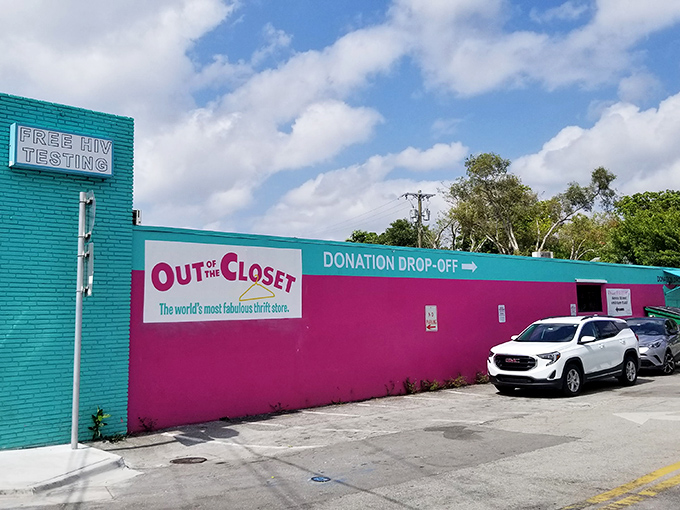 The unmistakable turquoise and pink exterior of Out of the Closet announces itself like a tropical beacon of bargains in Wilton Manors.