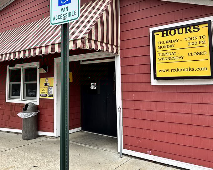 The iconic red exterior with its striped awning isn't trying to impress you—it's saving all that energy for what's inside.