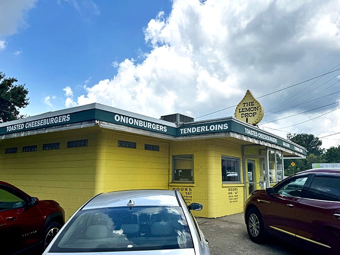 The sunshine-yellow exterior of The Lemon Drop isn't just a building—it's a time machine to when restaurants knew exactly what they were and embraced it wholeheartedly.