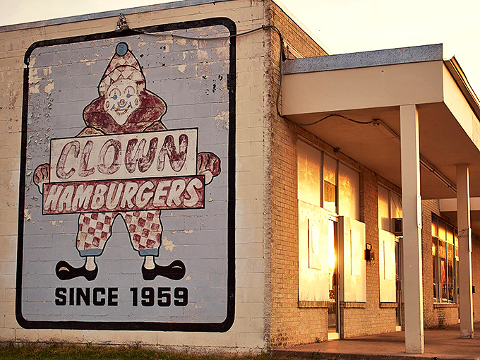 That weathered clown sign isn't just advertising – it's a beacon calling burger lovers home.