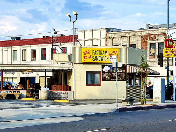 The iconic yellow and red exterior of The Hat in Alhambra stands as a beacon of pastrami perfection, promising culinary salvation to sandwich seekers.